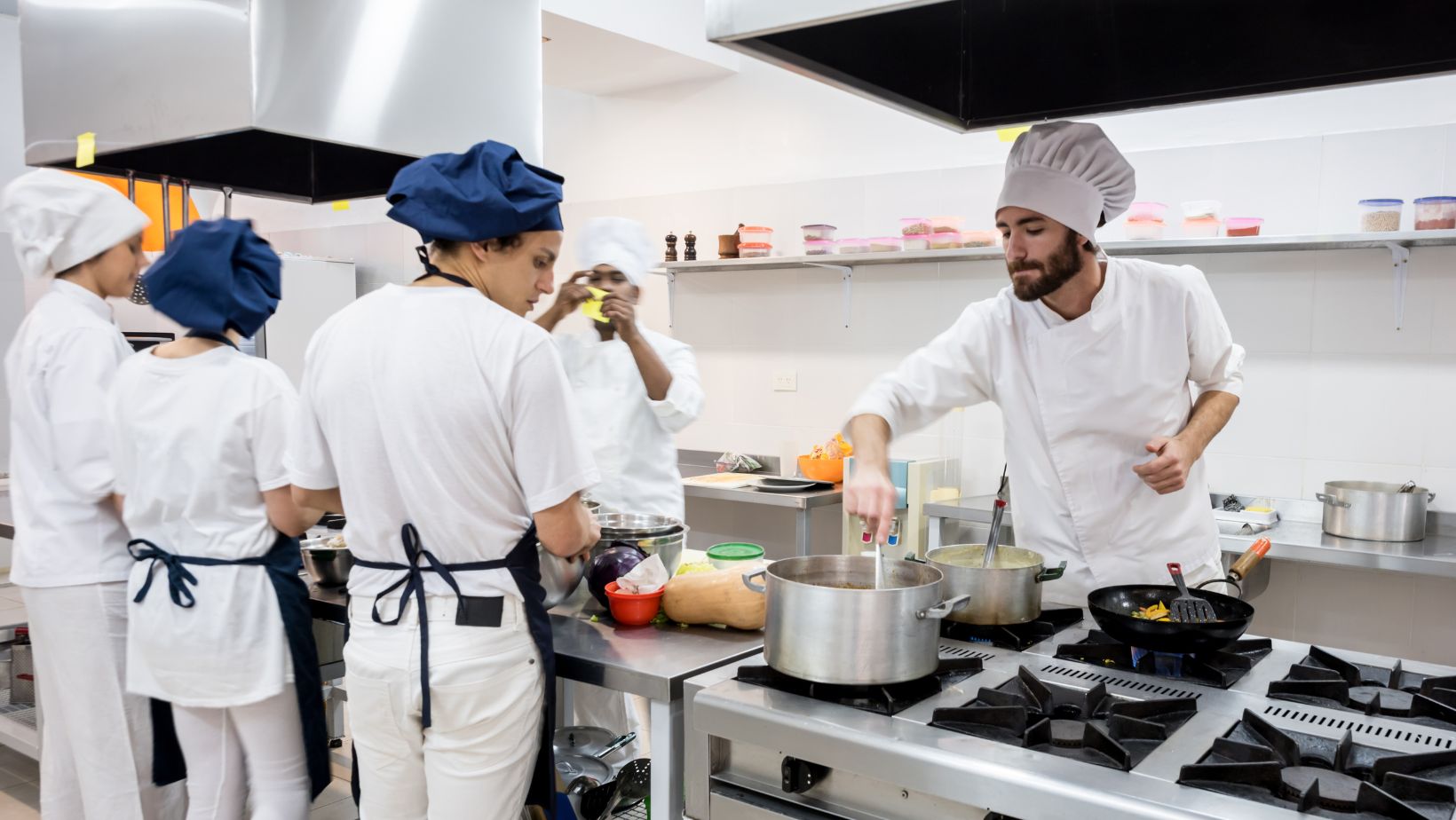 Efficiently and Safely of a Food Handler Fills Two Containers With ...